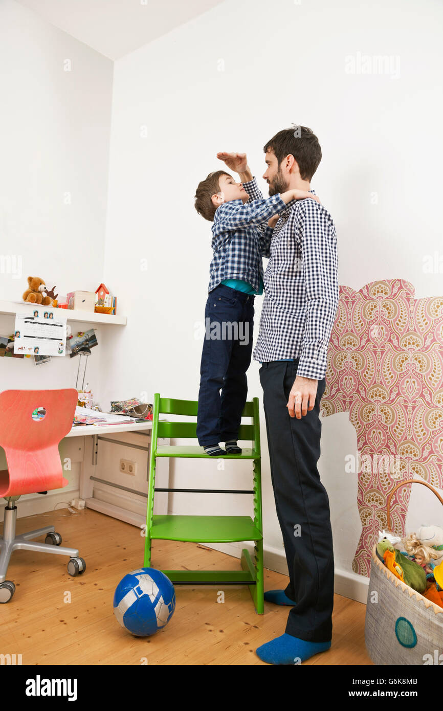 Tall boy parents hi-res stock photography and images - Alamy