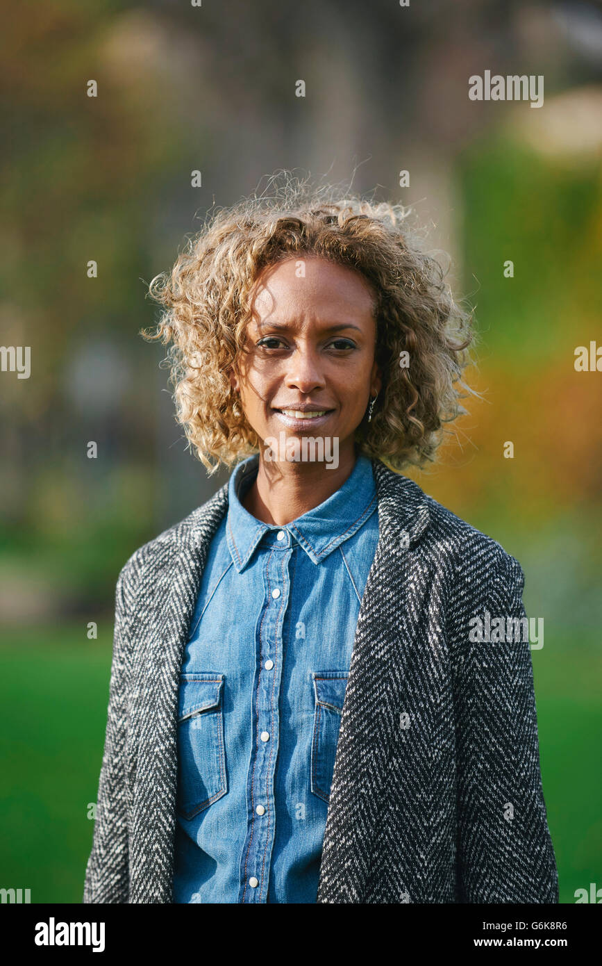 Portrait of smiling woman Stock Photo - Alamy