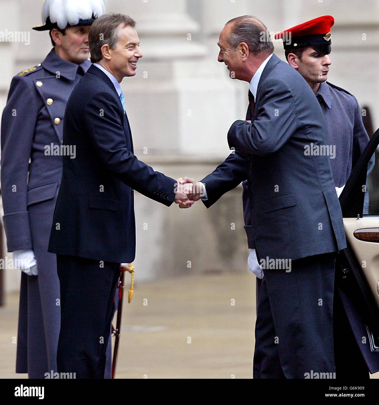 Foreign politics smiling shaking hands hi-res stock photography and ...