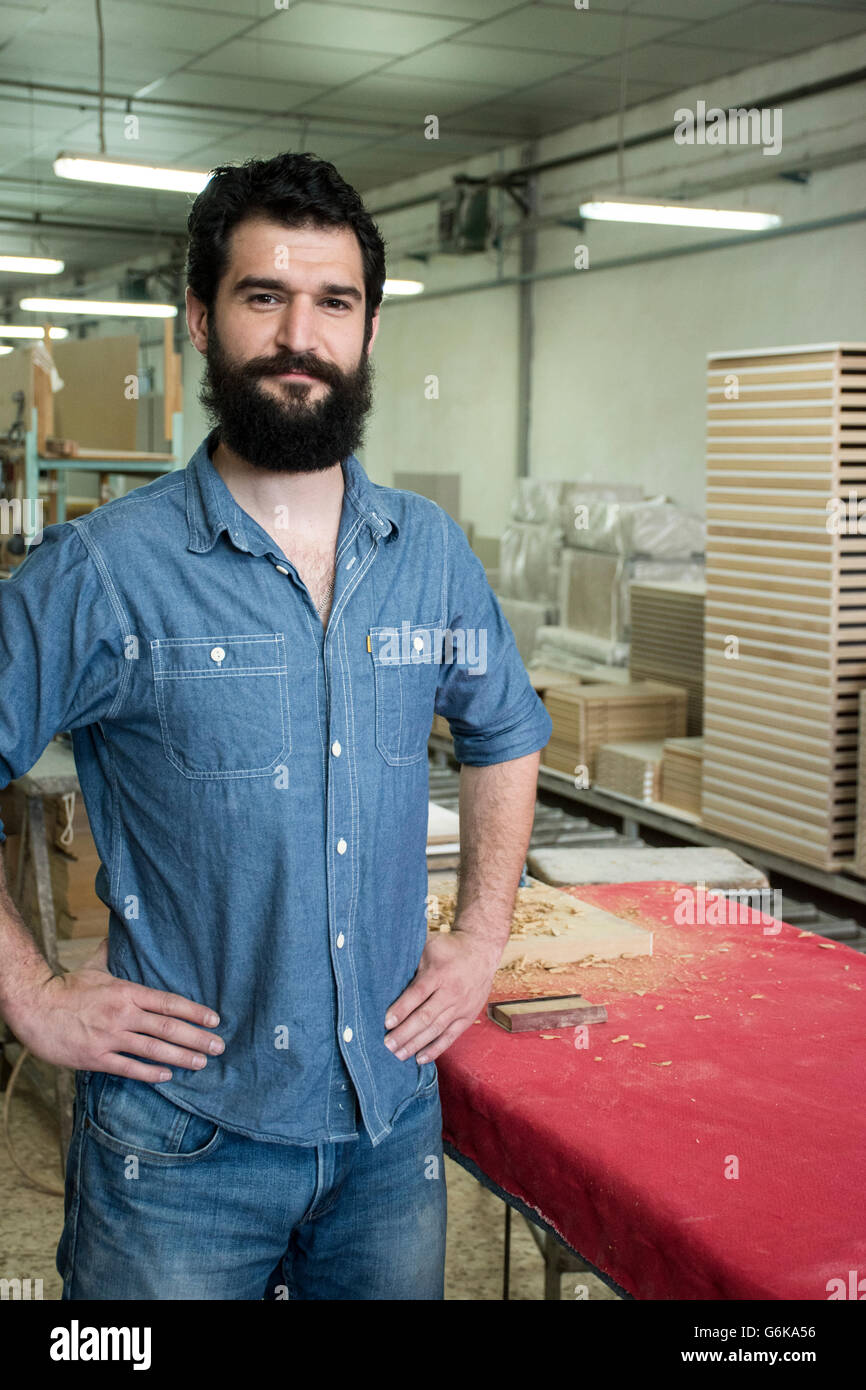 Portrait of carpenter smiling Stock Photo - Alamy