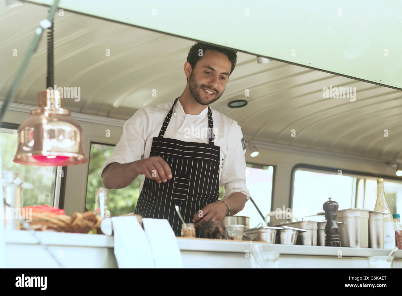 Working in a snack bar hi-res stock photography and images - Alamy
