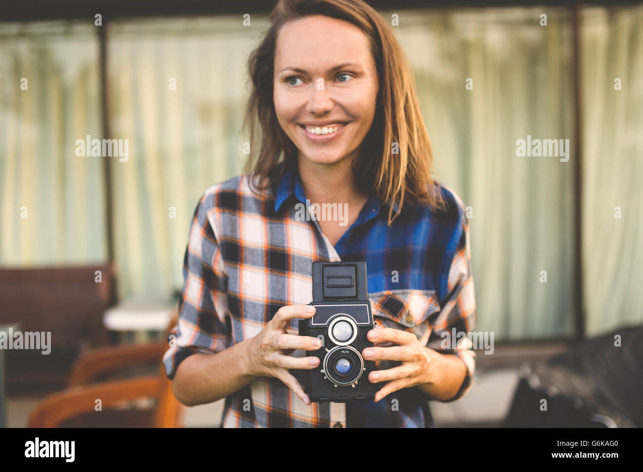 Woman with vintage camera Stock Photo - Alamy
