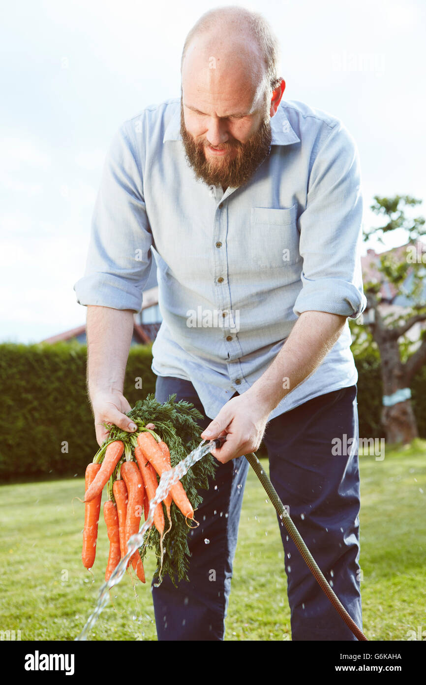 Cleaning carrots hi-res stock photography and images - Alamy