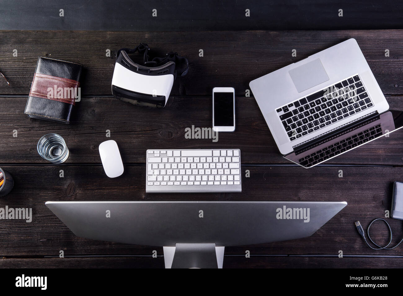 Desk computers virtual reality goggles hi-res stock photography and ...