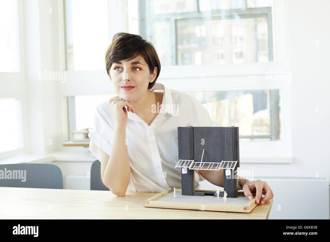 Portrait of architect with architectural model Stock Photo - Alamy