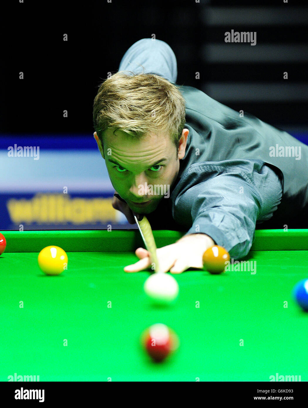 Ali Carter in action in his first round match against Ratchayothin ...