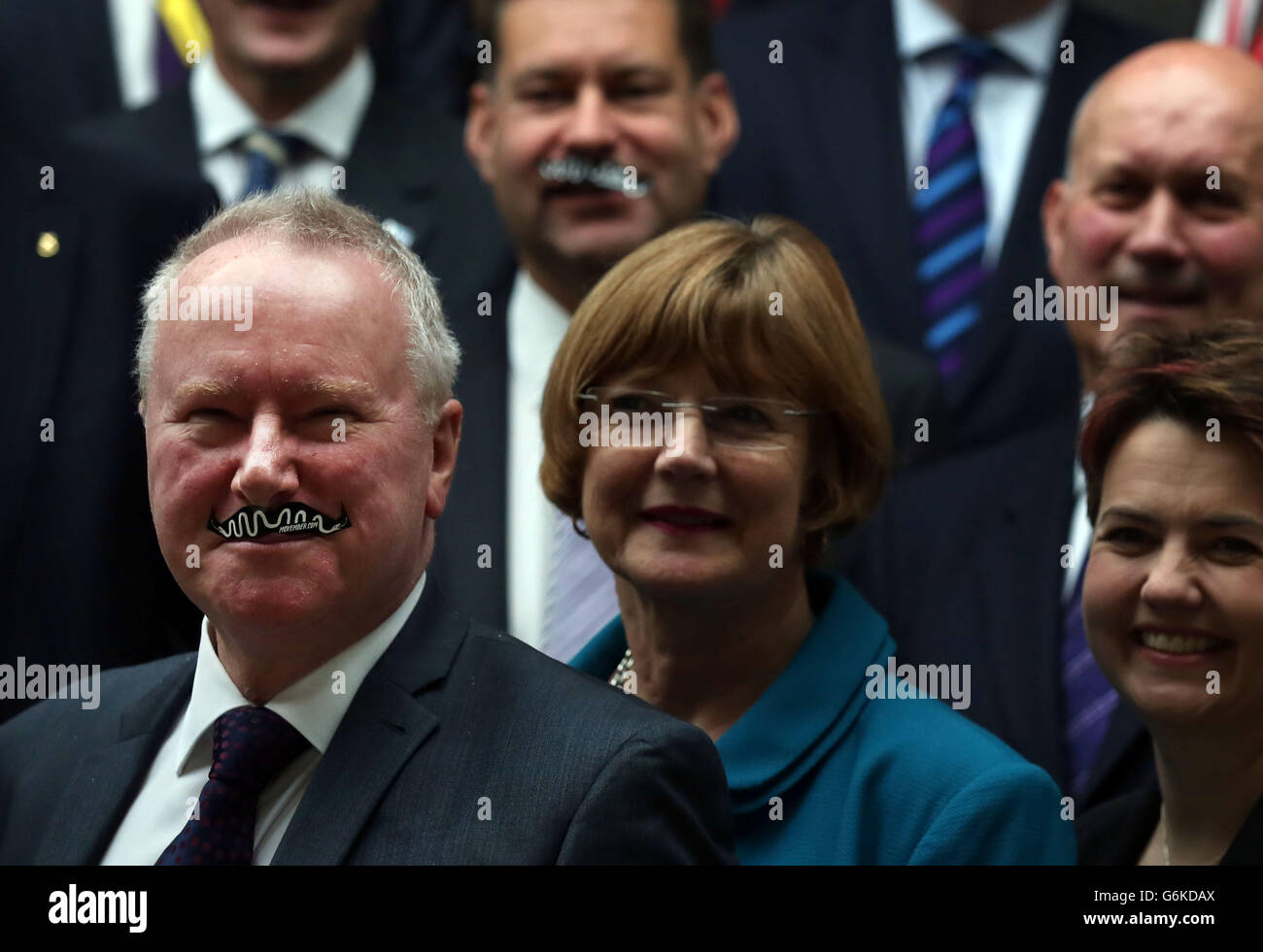 Scottish Secretary for Health Alex Neil poses for photographs with MSPs ...