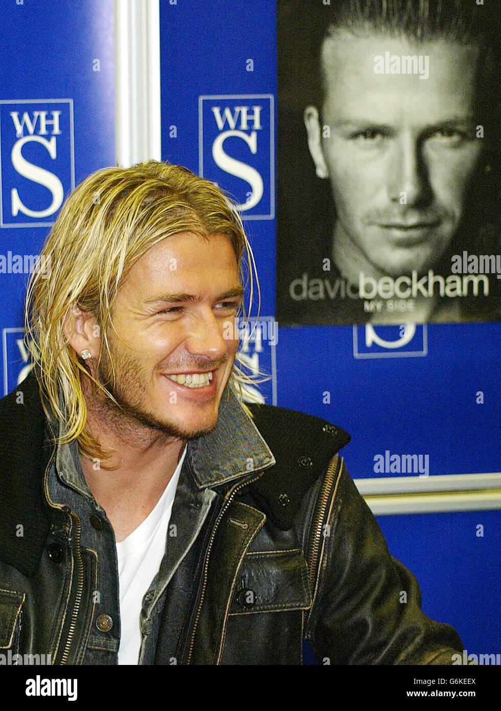 England football captain david beckham signs copy autobiography my side ...