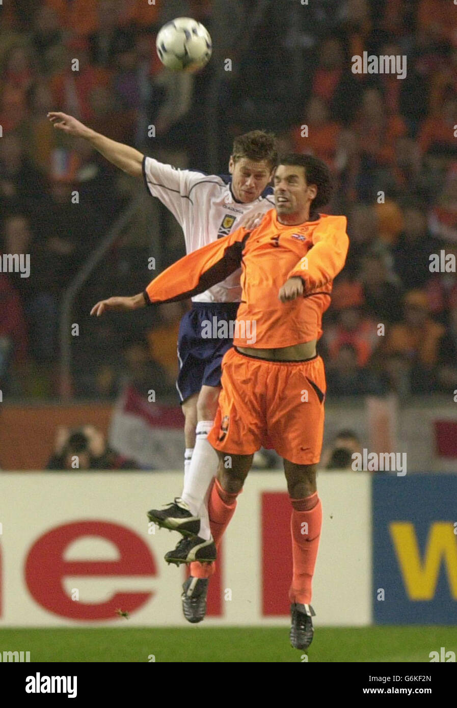 : Scotland's Gary Naysmith challenges Holland's Ruud Van Nistleroy ...