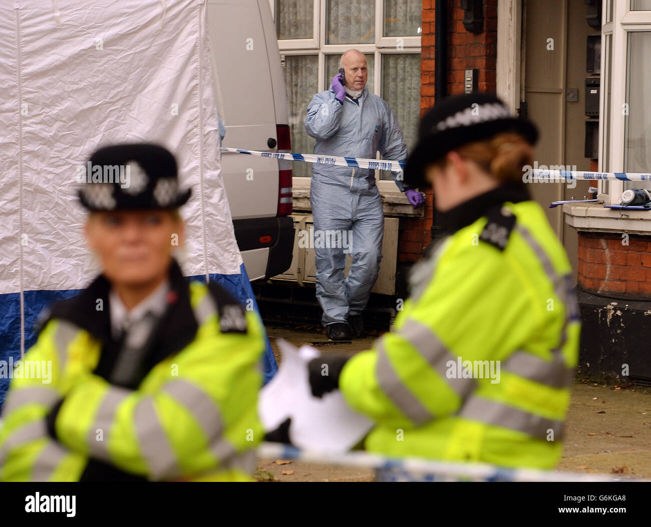 Forensic Officers By A Metropolitan Police Forensic Tent That Covers