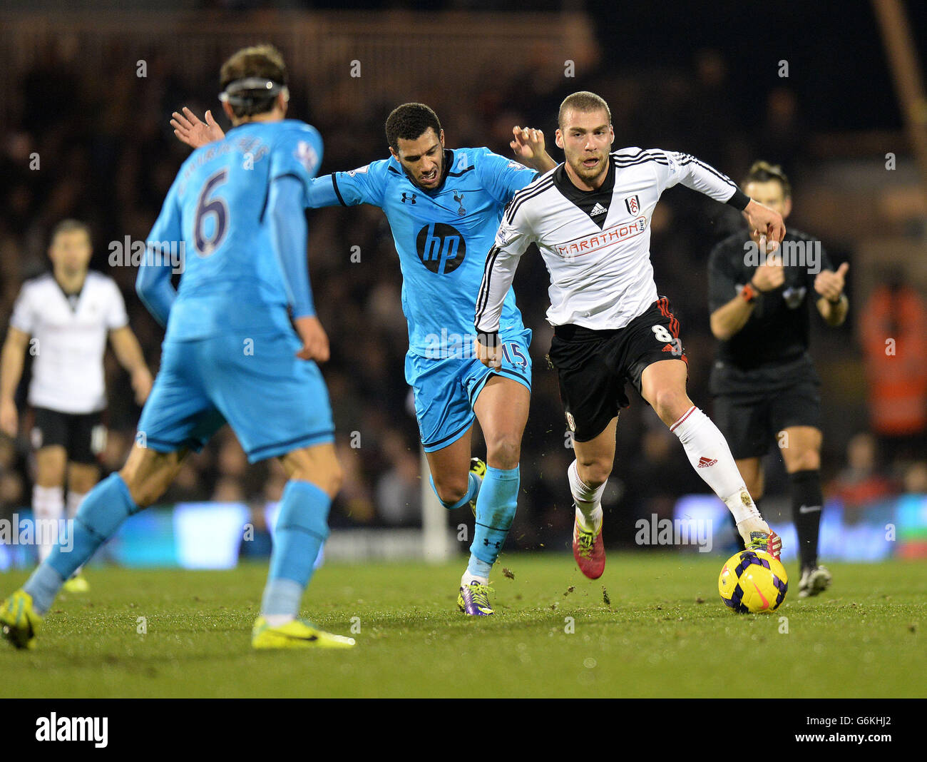 Pajtim Kasami of Fulham tholds off a challenge from Etienne Capoue of ...