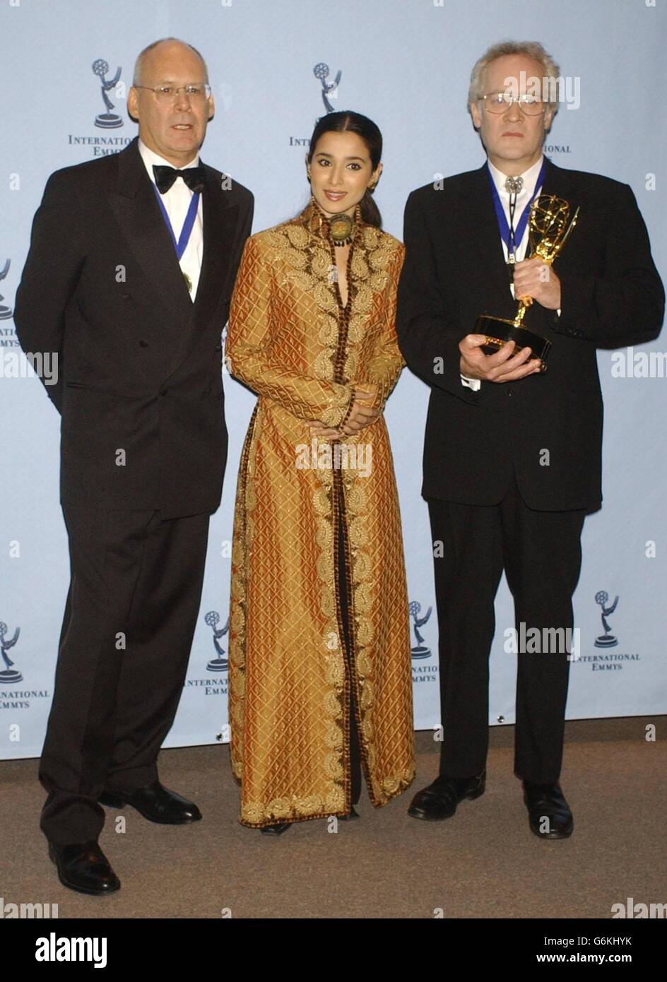 Indian actress Simone Singh presents Adam Low (left) and Anthony Wall ...