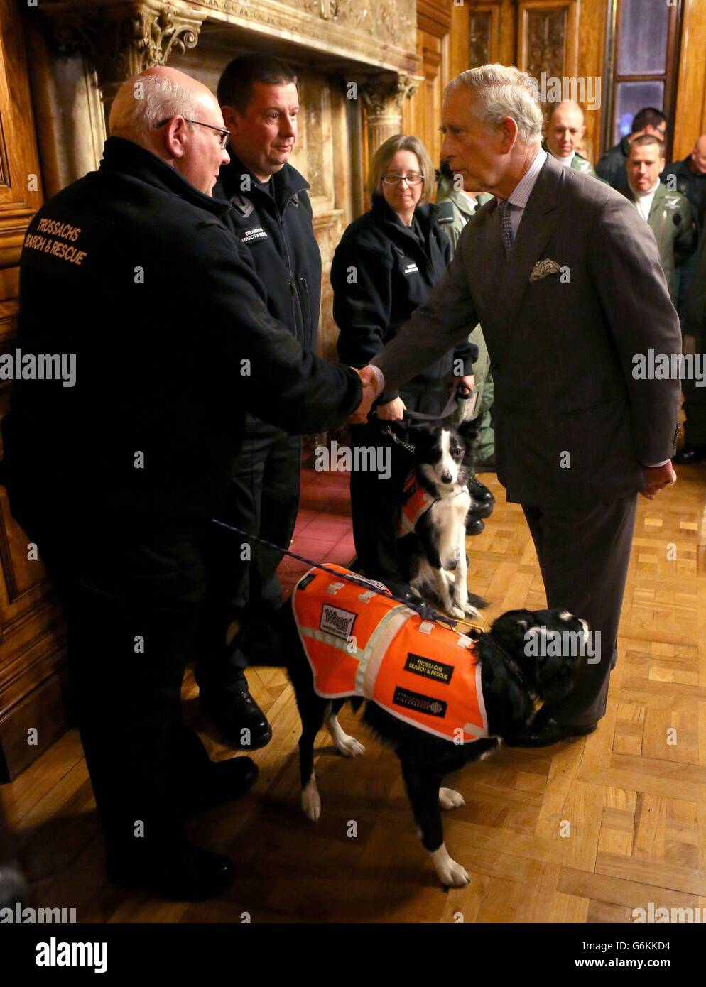 Prince Charles (right) meets rescue workers at a reception at the City ...
