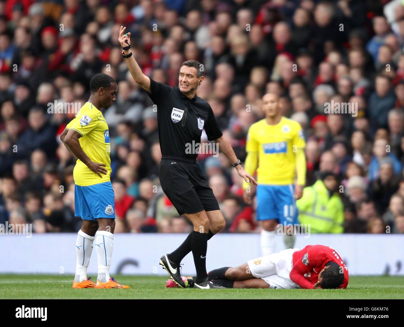 Football referee assistance hi-res stock photography and images - Alamy