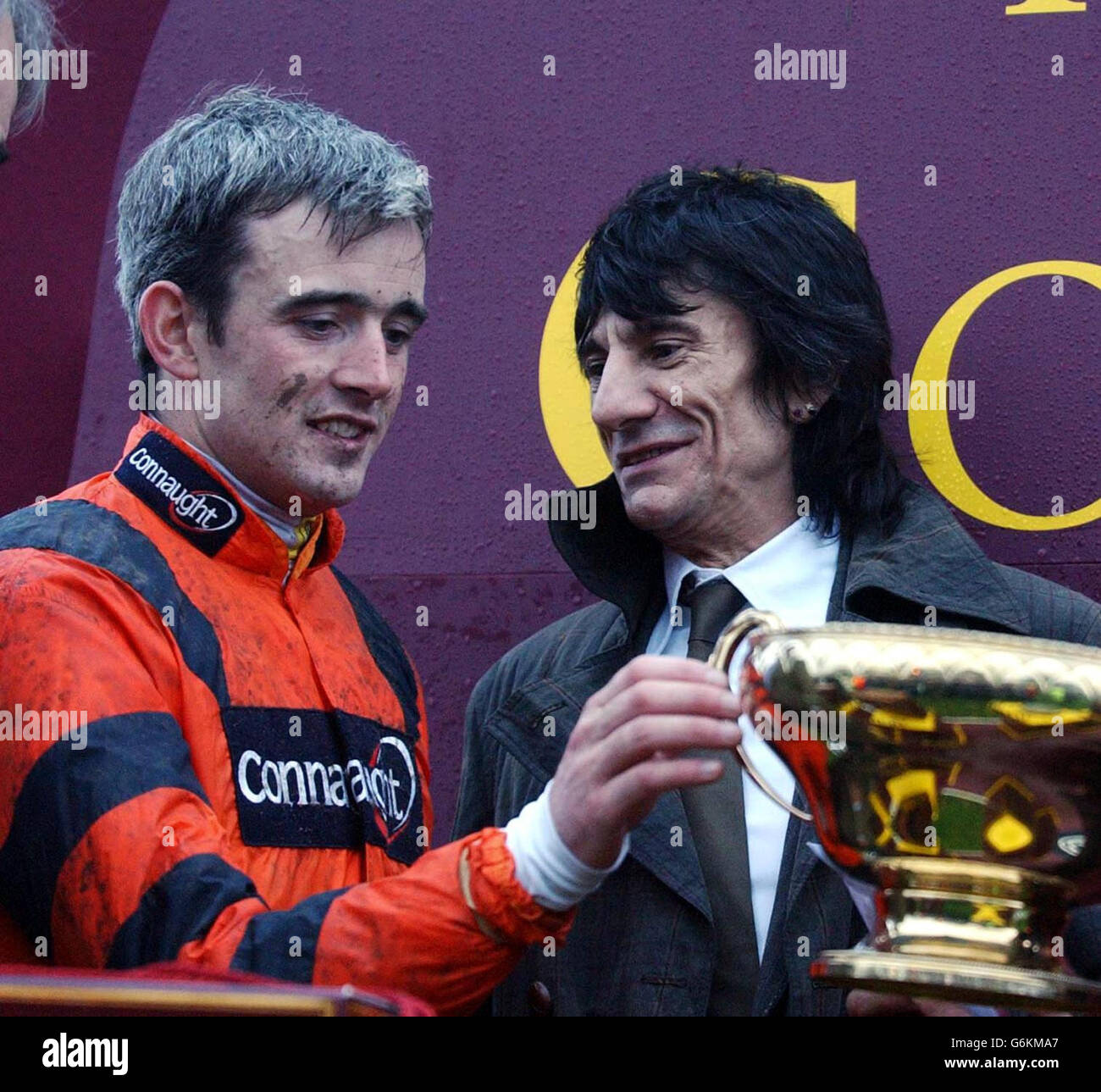 Jockey Ruby Walsh with the trophy and Ronnie Wood (who made the ...