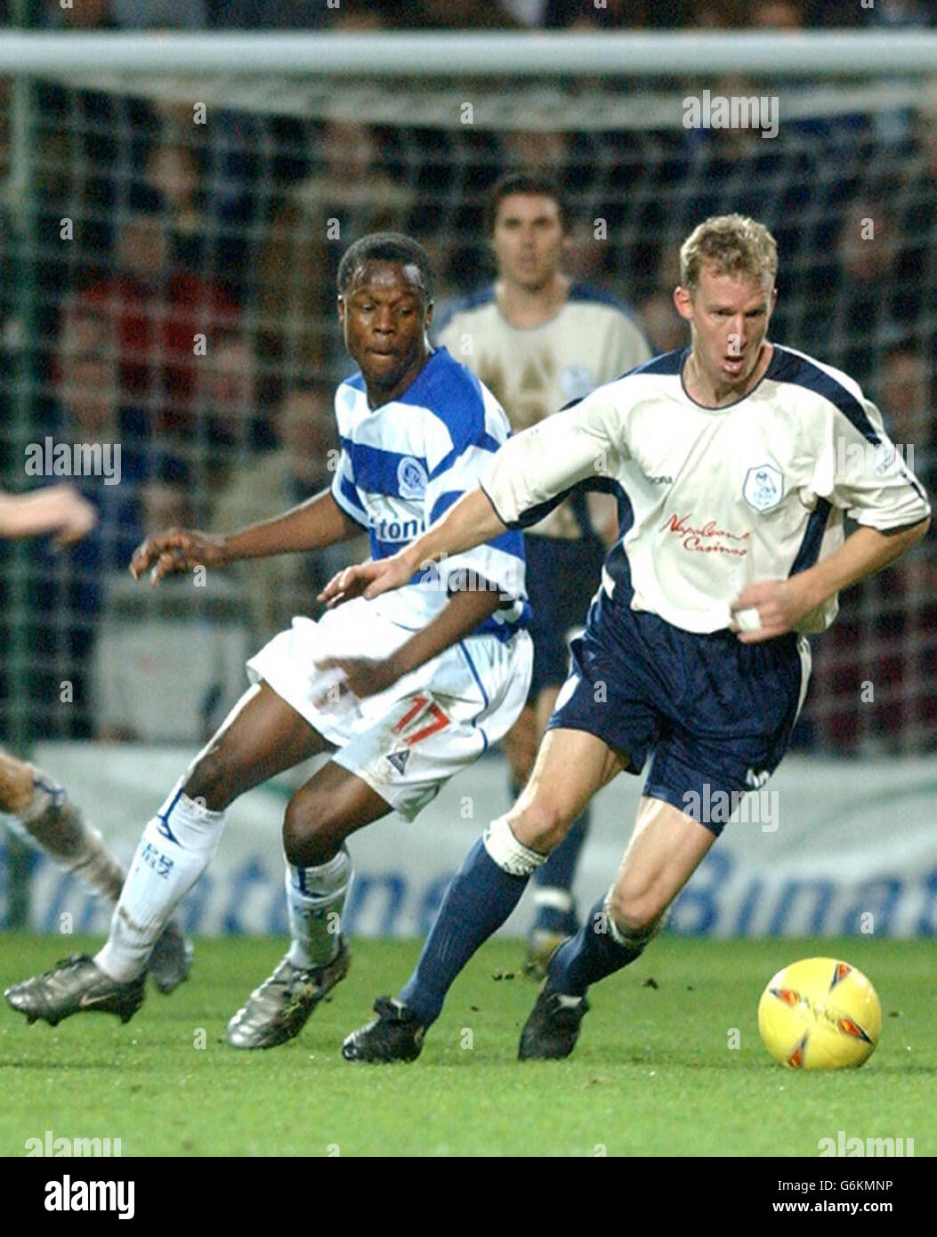 QPR's Marcus Bean (left) and Sheffield Wednesday's Robbie Mustoe during ...