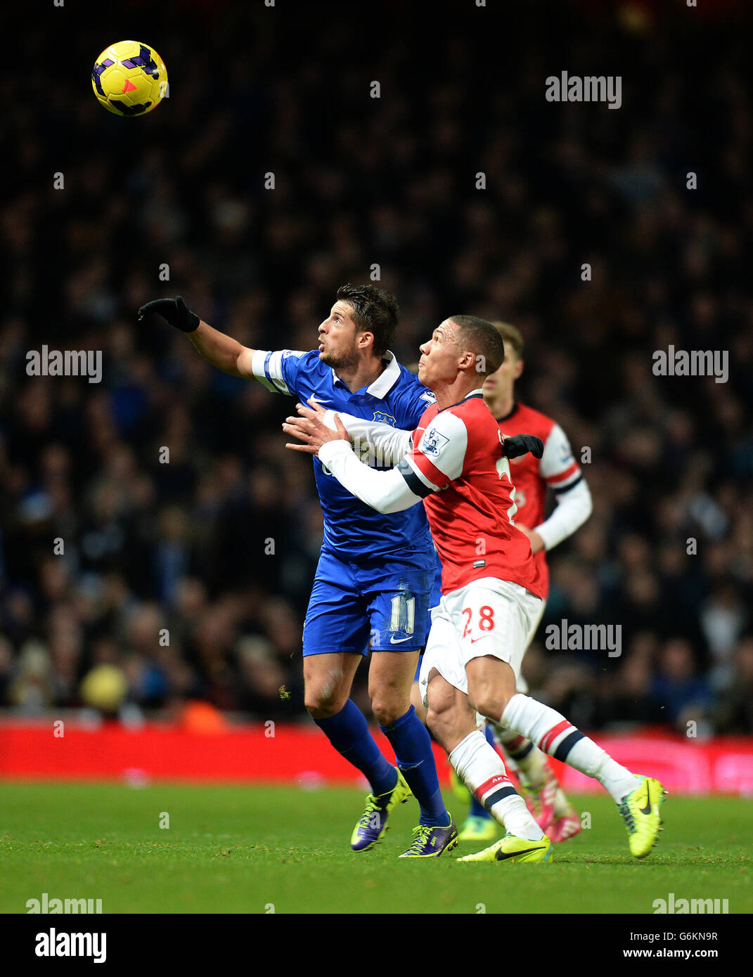 Arsenals kieran gibbs challenges evertons kevin miralles for the ball ...