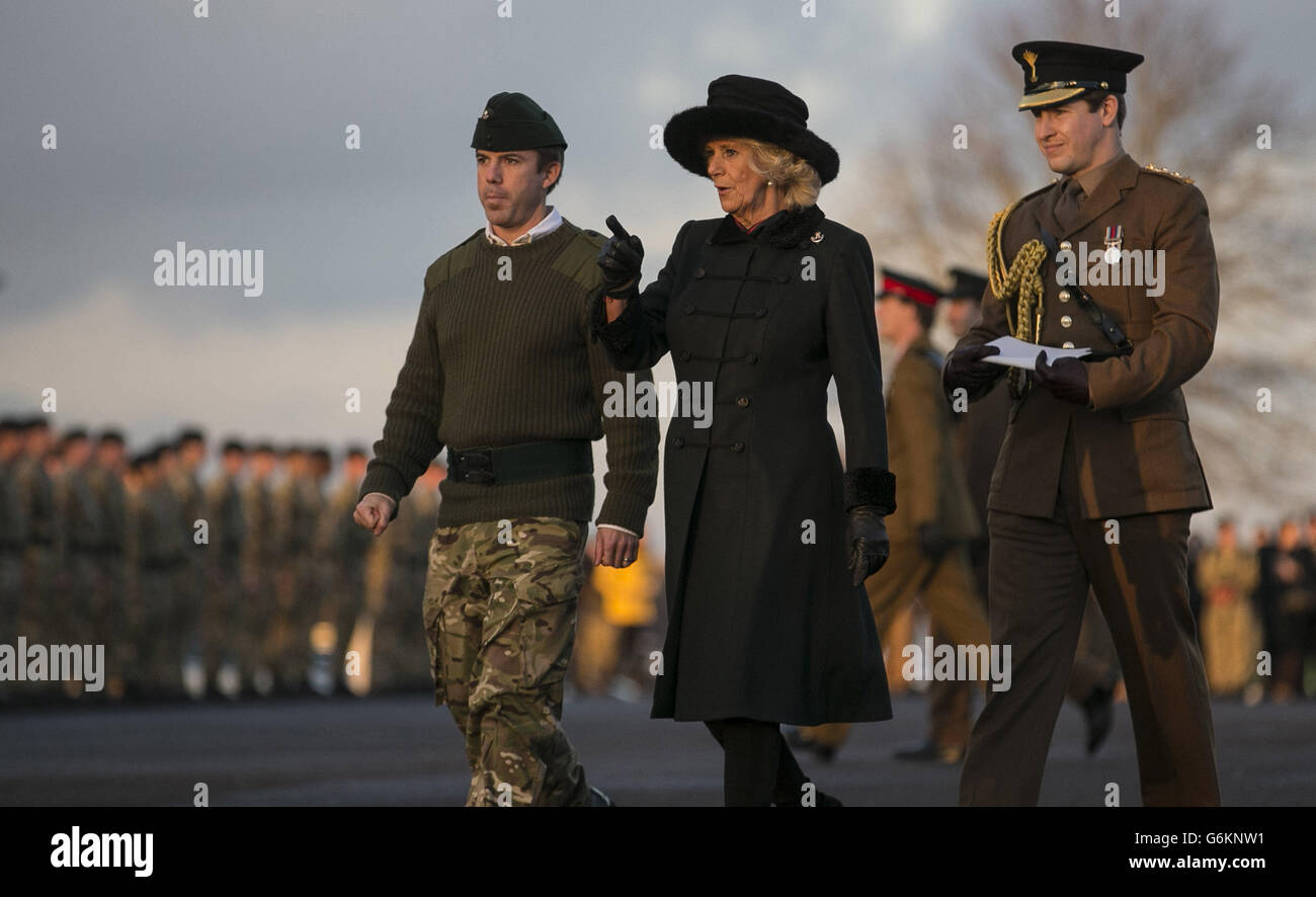 The Duchess of Cornwall (centre) accompanied by CO 4 RIFLES, Lt Col Tom ...