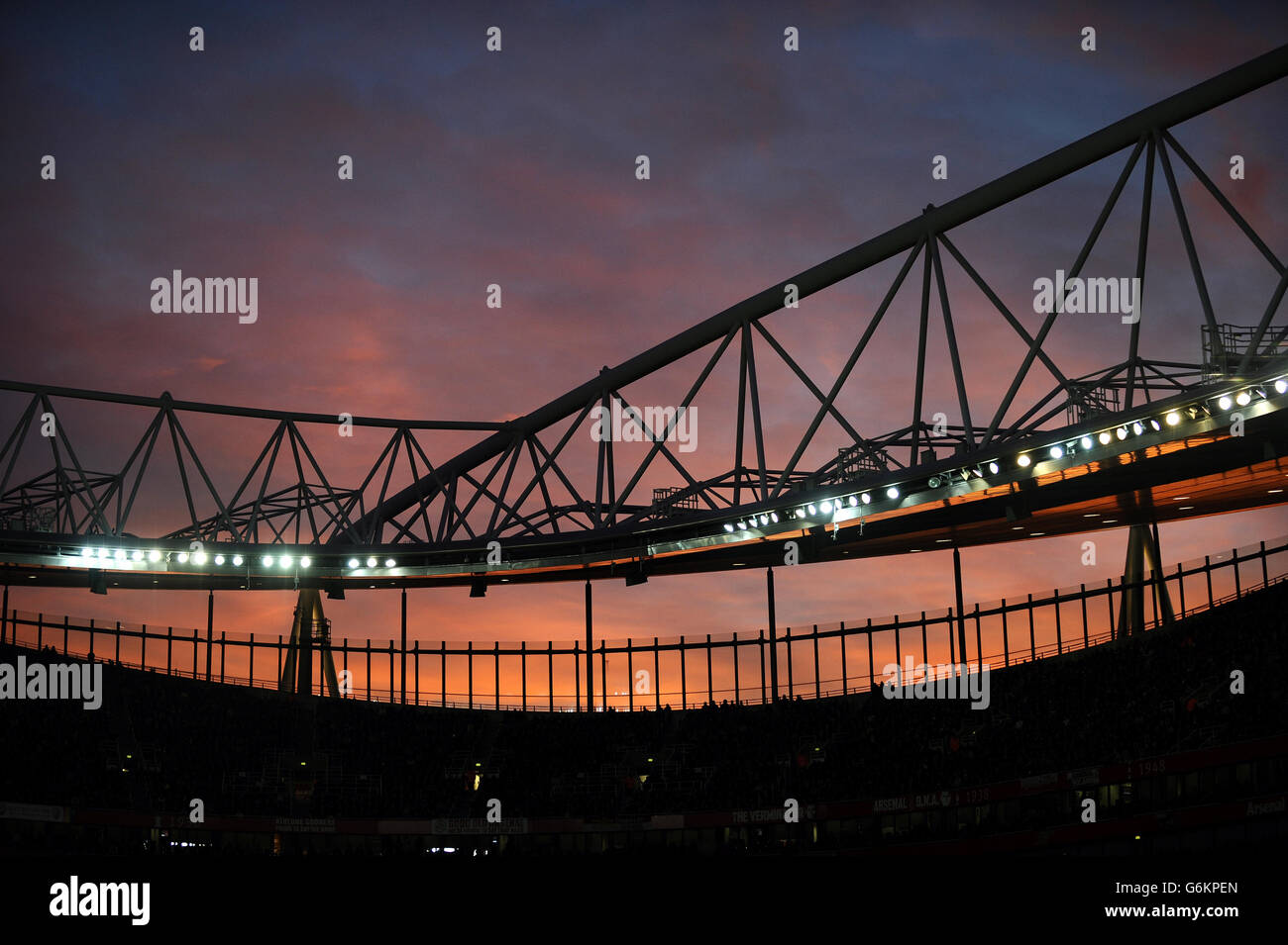 The sun sets behind the stands at the Emirates Stadium Stock Photo - Alamy