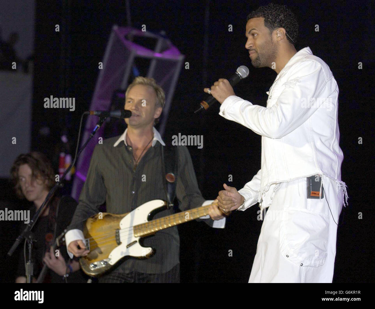 Sting performing on stage with craig david hi-res stock photography and ...