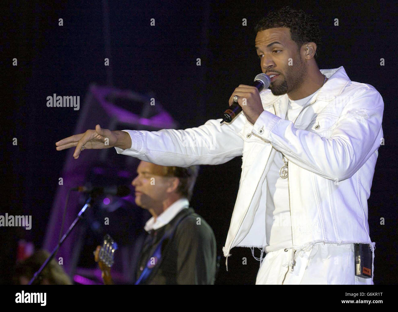 Sting performing on stage with craig david hi-res stock photography and ...