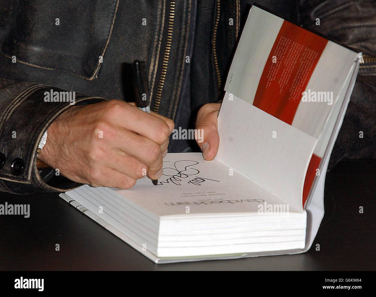 England footballer David Beckham signs copies of his new book "David ...