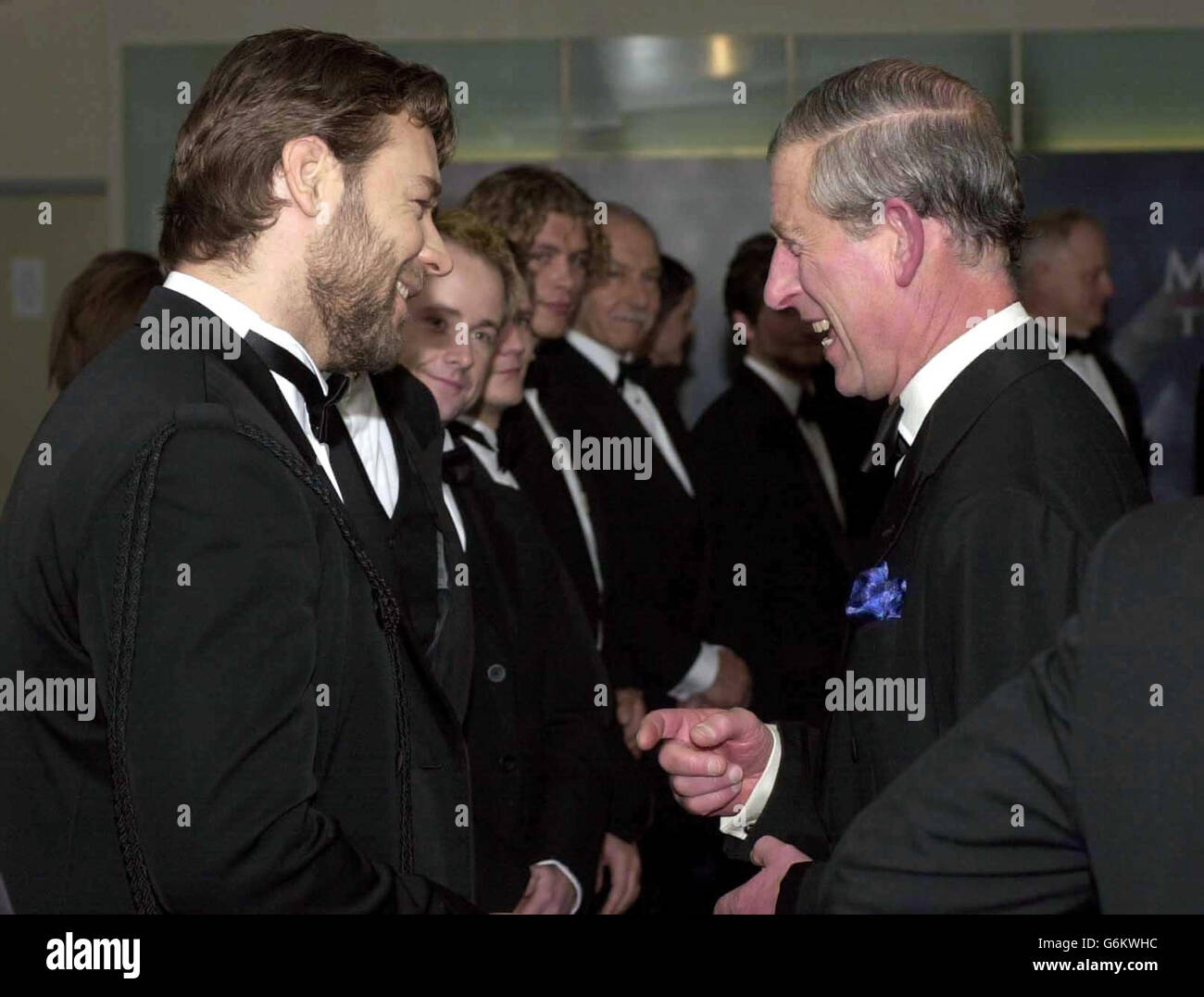 The Prince of Wales talks to star Russell Crowe as he arrives for the ...