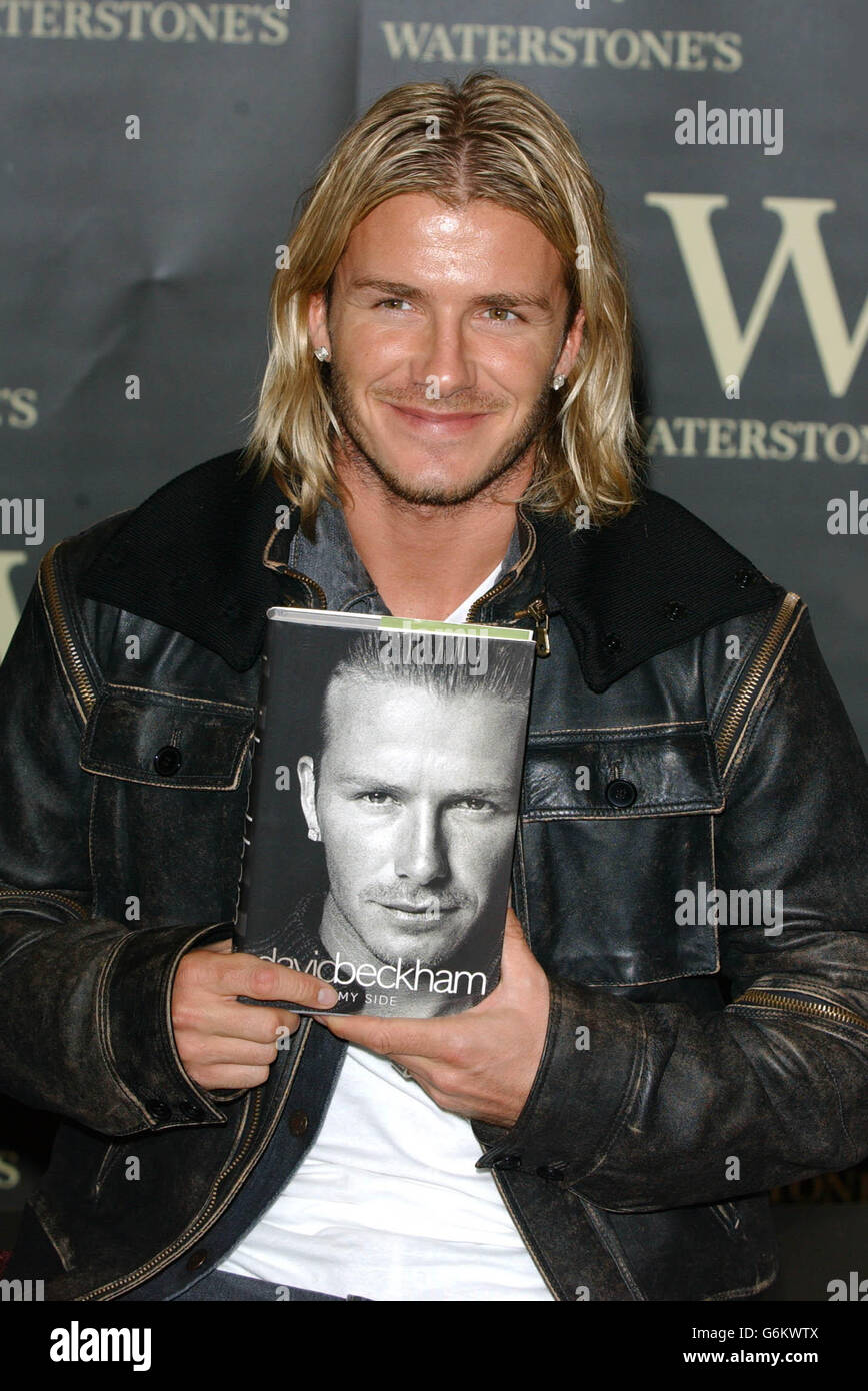England footballer David Beckham signs copies of his new book "David ...