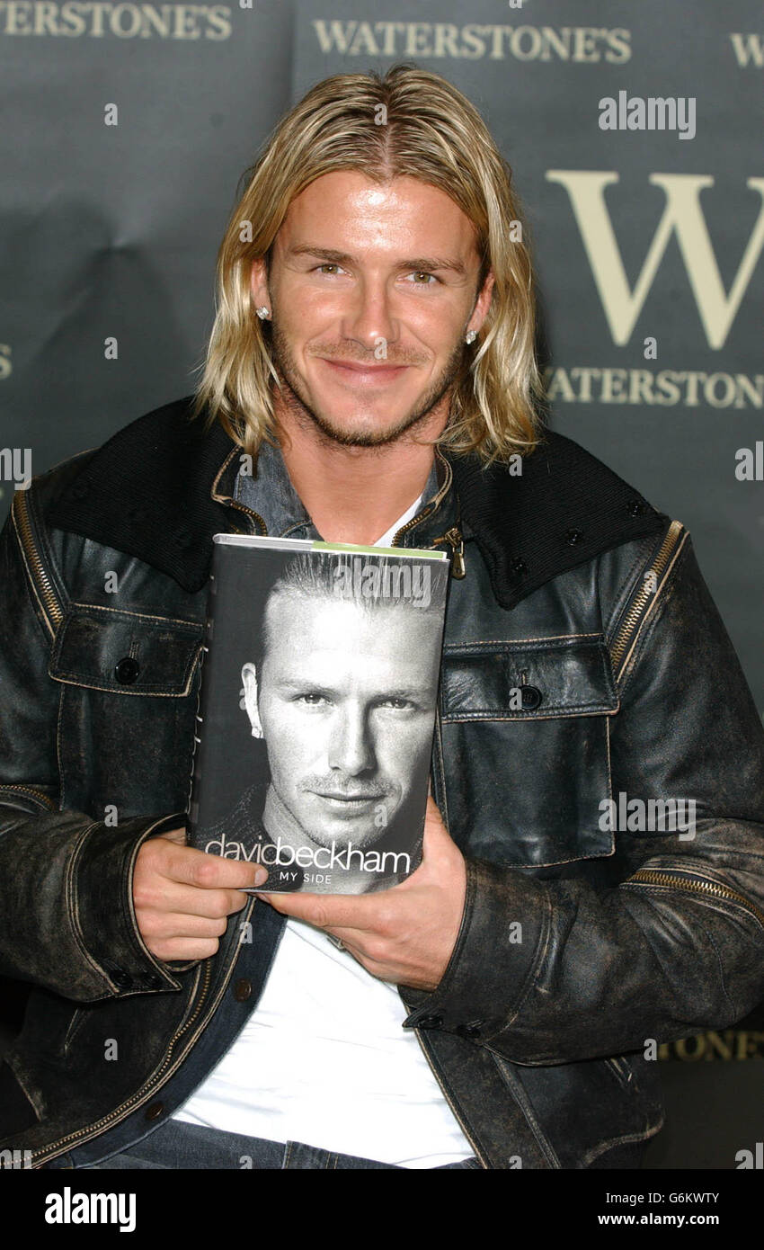 England footballer David Beckham signs copies of his new book "David ...