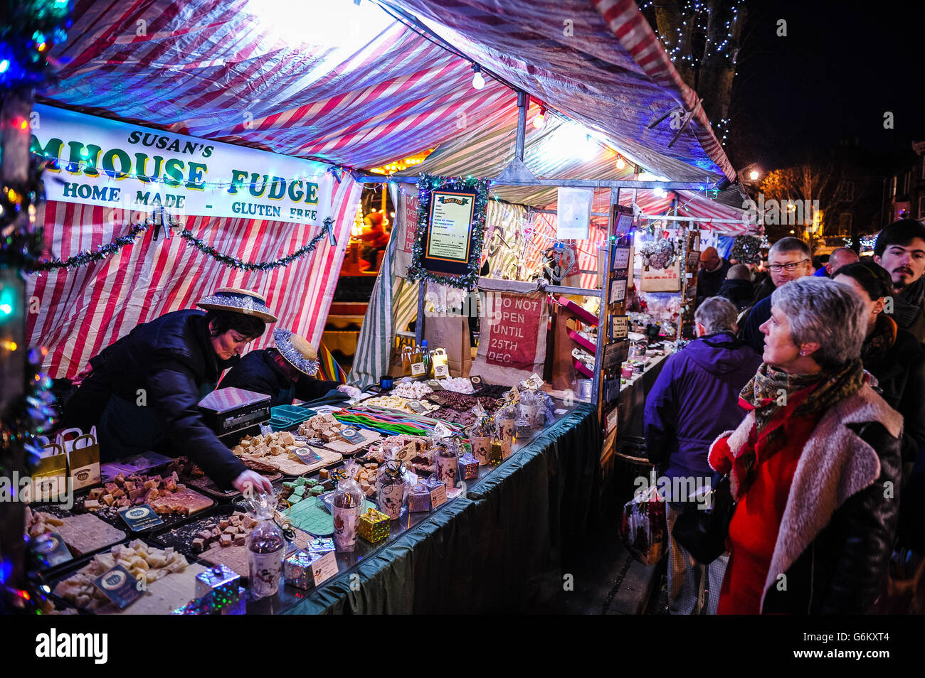 Harrogate Christmas Market. Shoppers at a fudge stall in the Harrogate ...