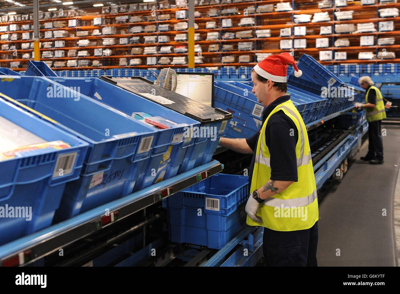 Paul Hardwick prepares orders for delivery at the Argos distribution ...