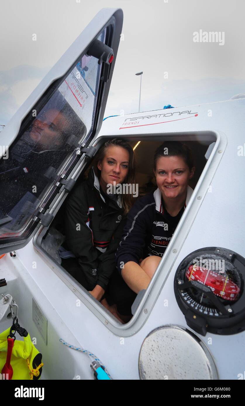 Lauren Morton (left) and Hannah Lawton, pose for a picture in the cabin ...