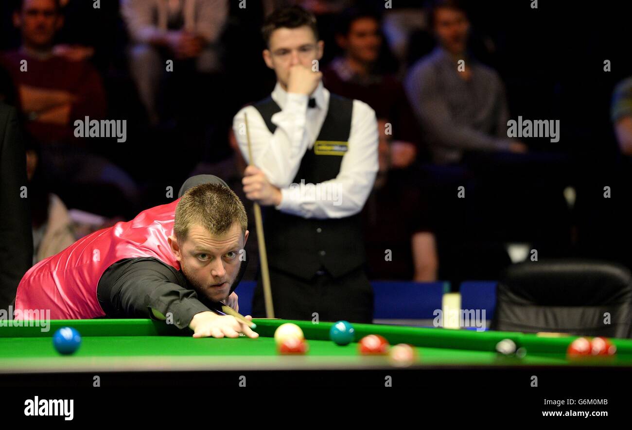 Mark Allen in action against Michael Holt (right) during day eight of ...