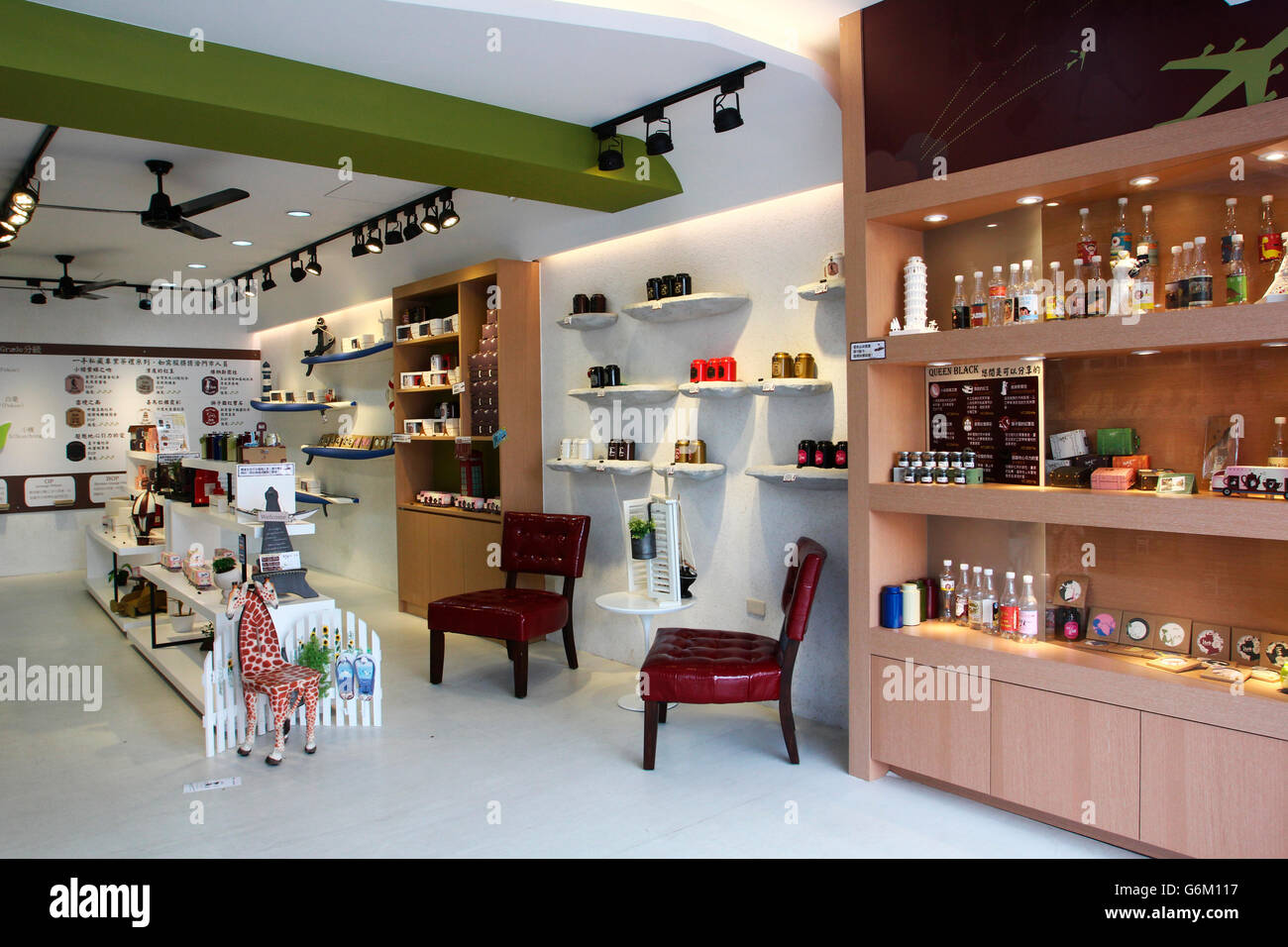 Kenting Street night market snack Black tea in one hand Stock Photo - Alamy