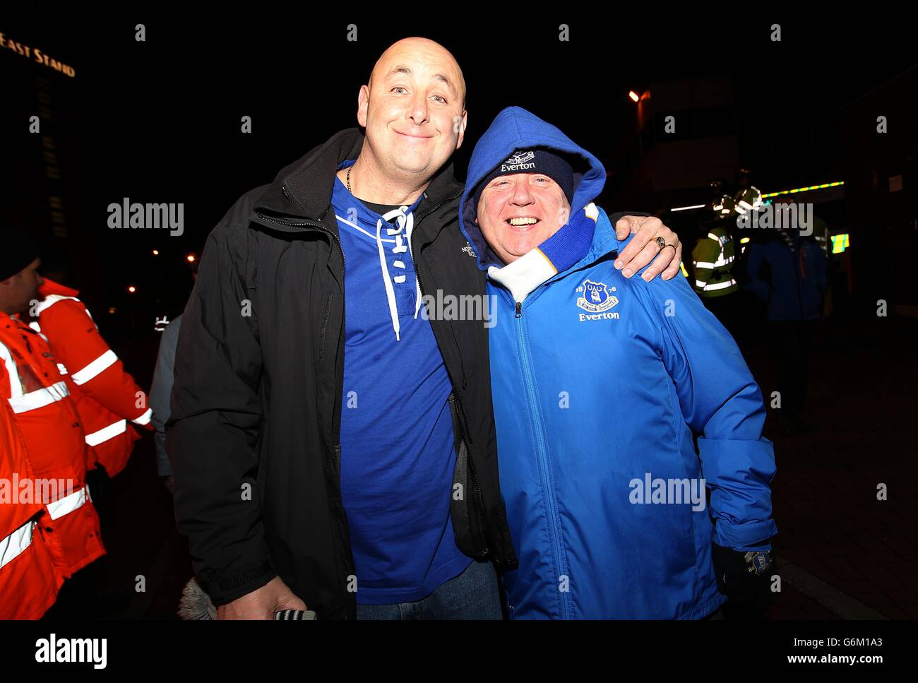 An Everton fans stands outside Old Trafford before the game Stock Photo ...