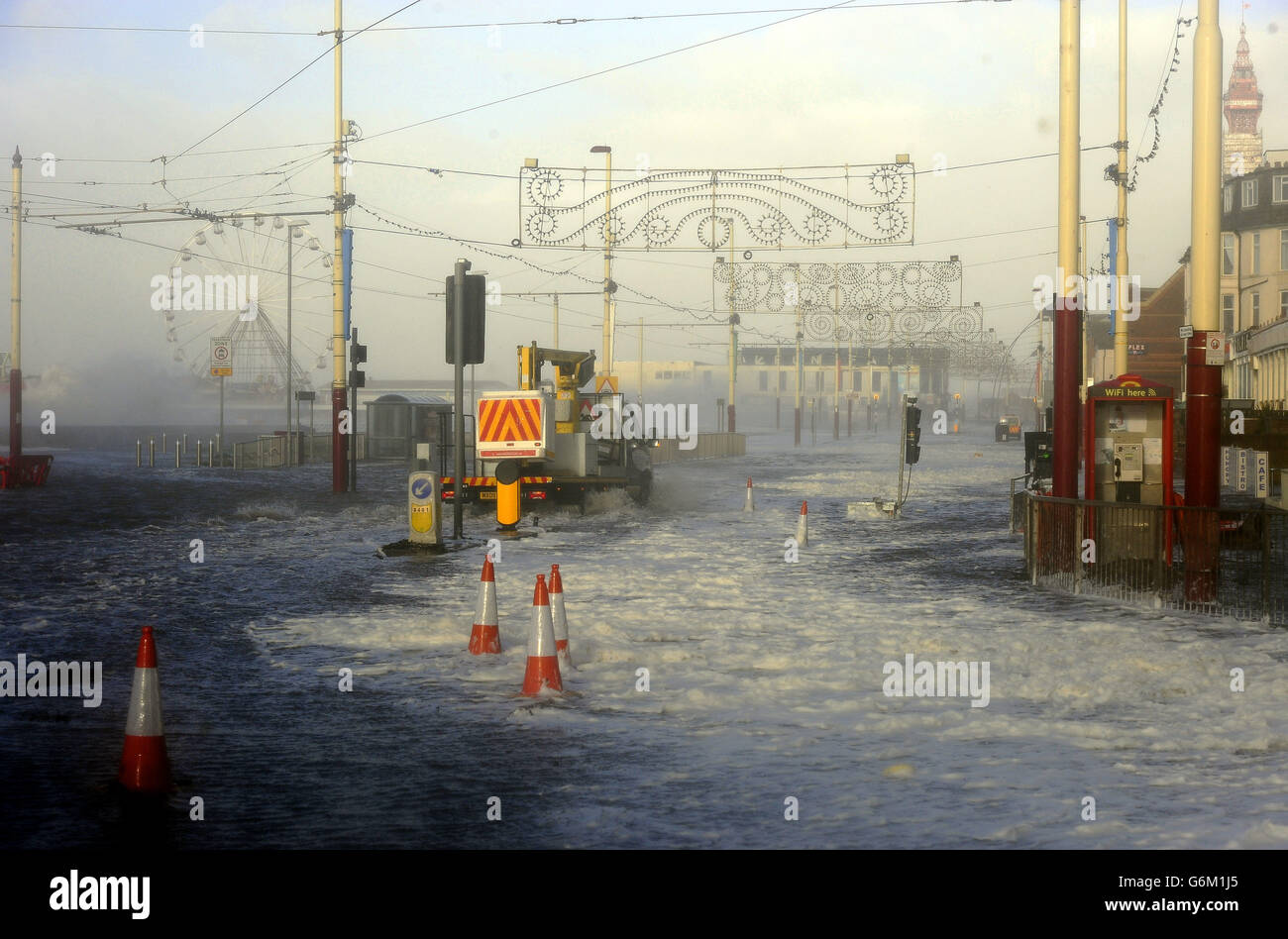 Blackpool Main Promenade under flood water following high tide and a ...