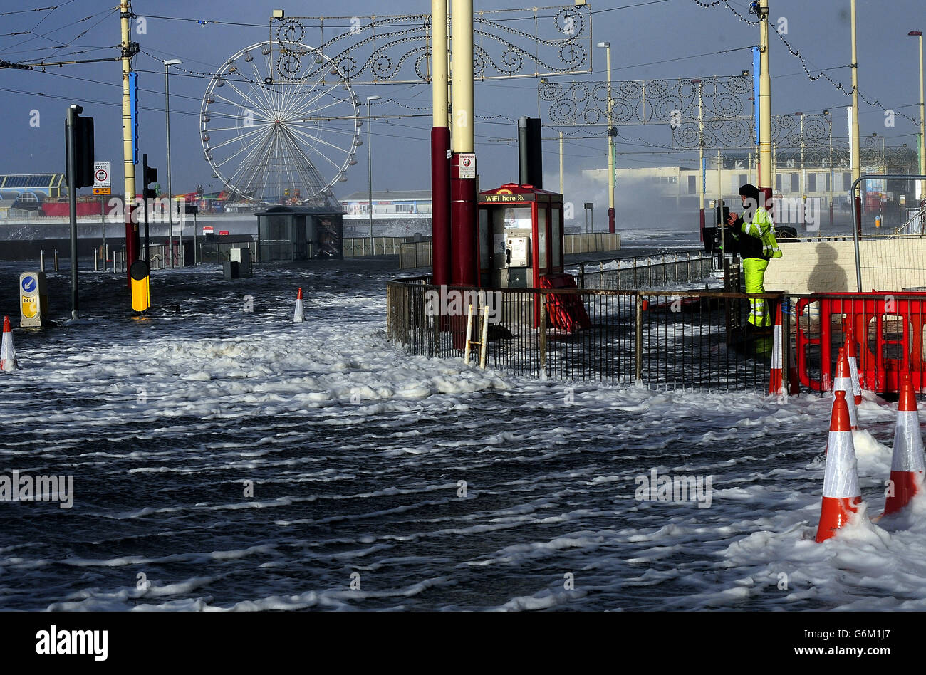 Blackpool Main Promenade under flood water following high tide and a ...