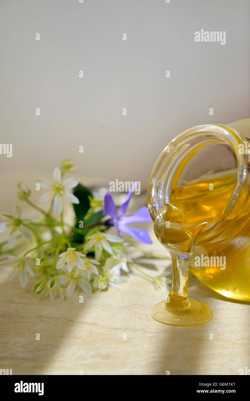 honey flowing down and flowers Stock Photo - Alamy