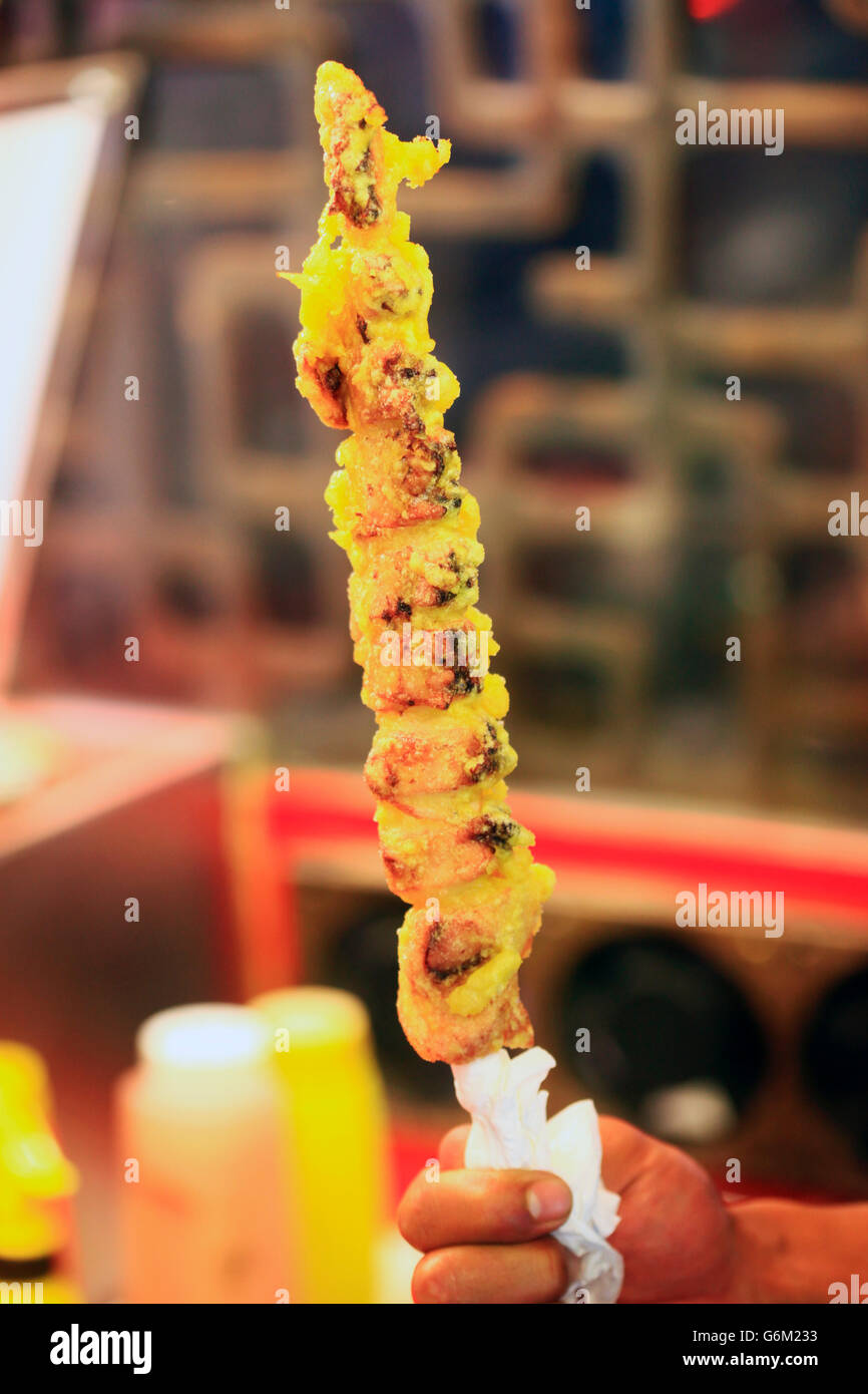 Kenting Street night market snack Octopus a shoulder pole Stock Photo ...