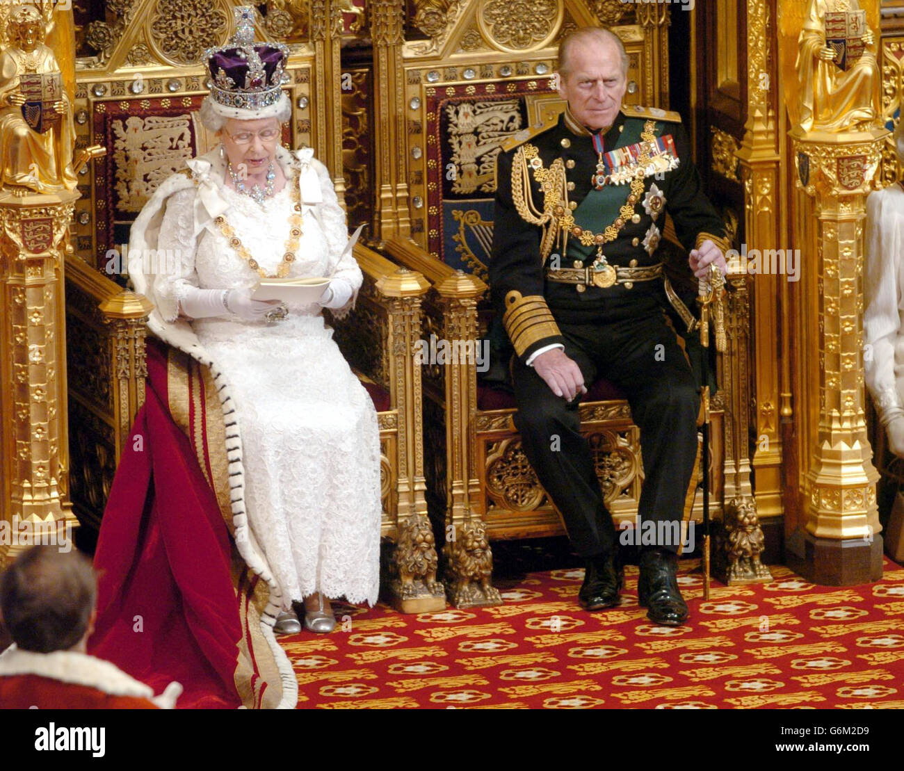 Queen sitting on her throne hi-res stock photography and images - Alamy