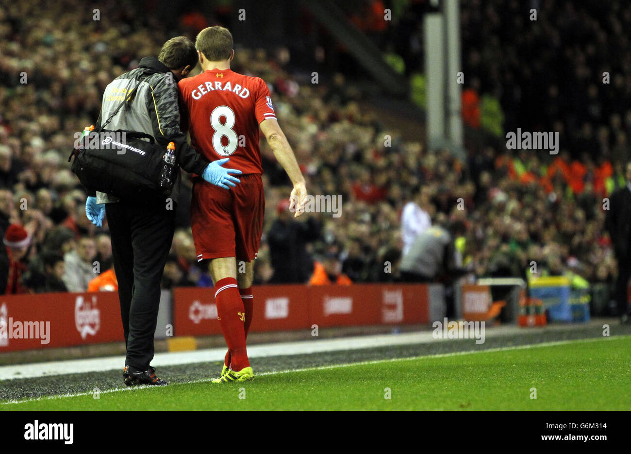 Liverpool's Steven Gerrard pulls up with an injury during the Barclays ...
