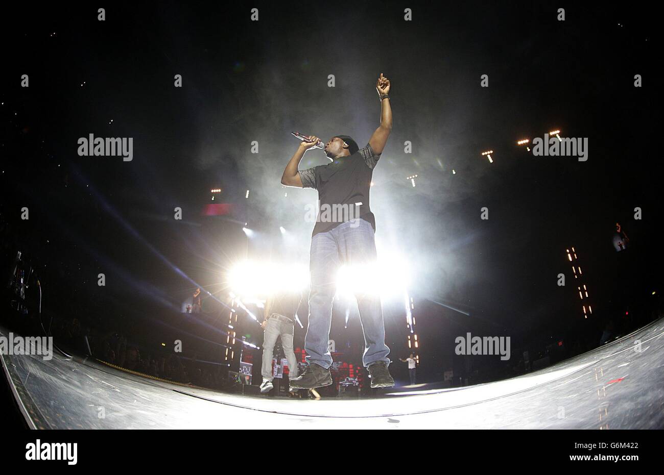 In this picture taken with a fish eye lens a member of Dizzee Rascal's ...
