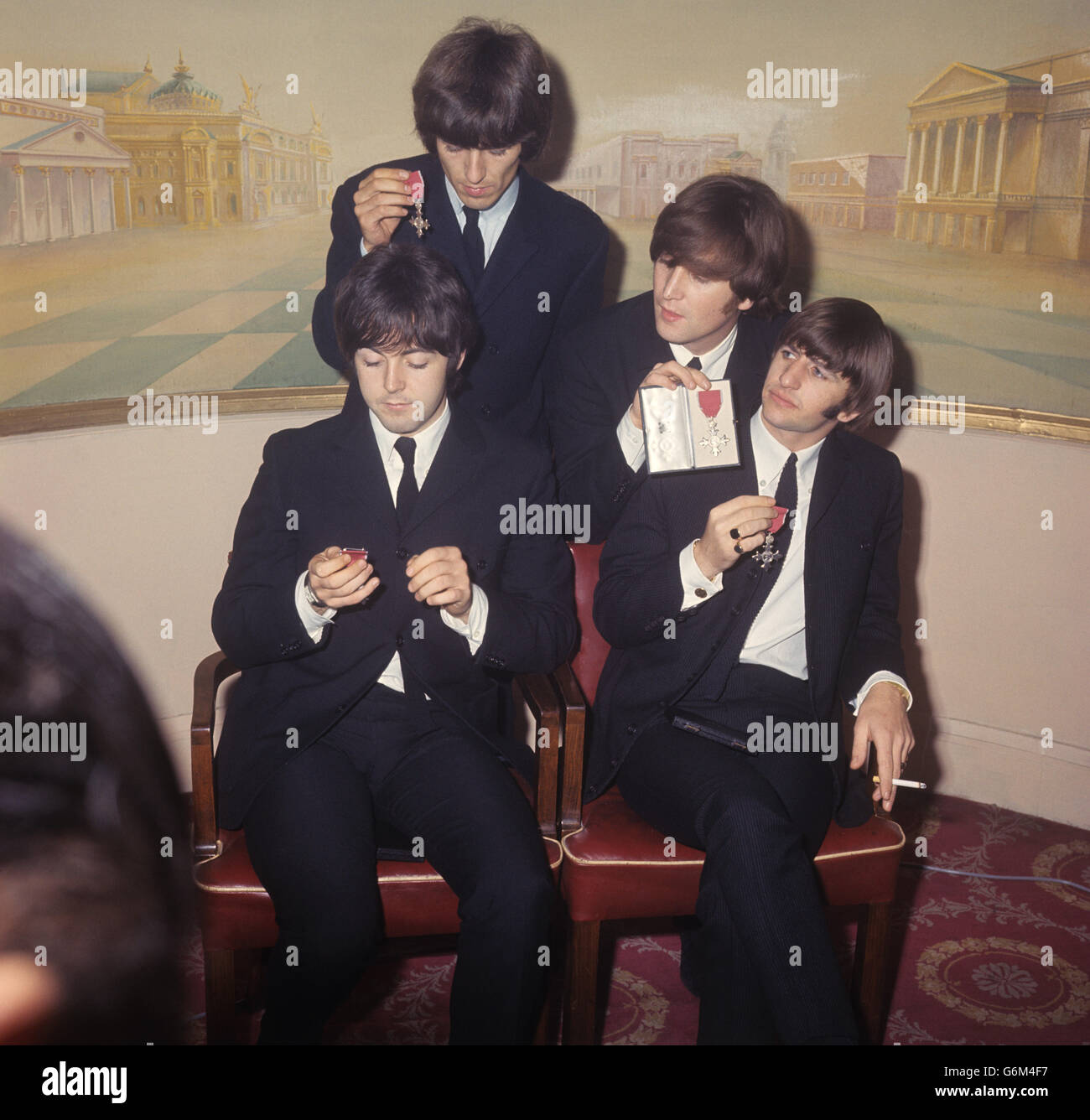 The Beatles display their MBEs at the Saville Theatre, after receiving ...