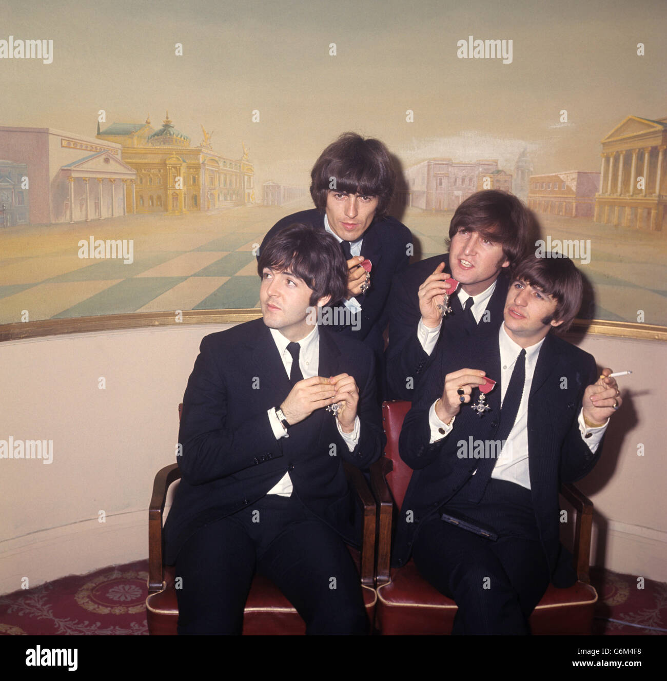 The Beatles display their MBEs at the Saville Theatre, after receiving ...