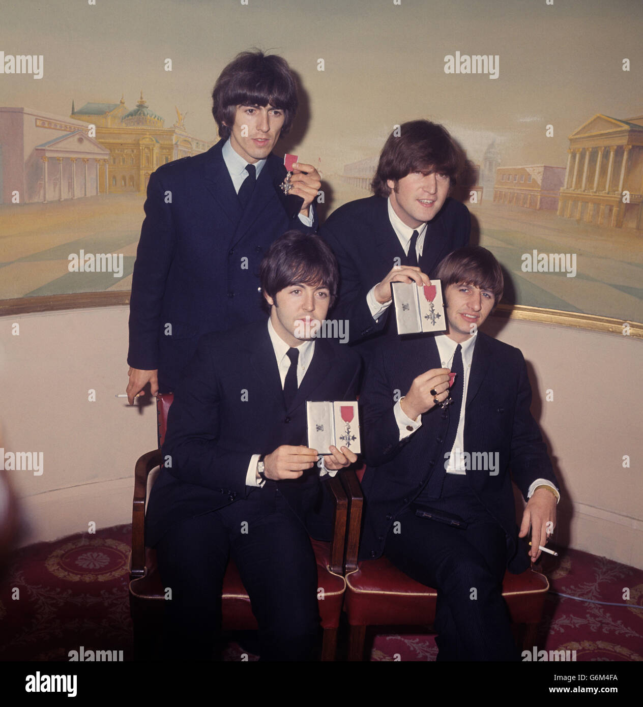 The Beatles display their MBEs at the Saville Theatre, after receiving ...