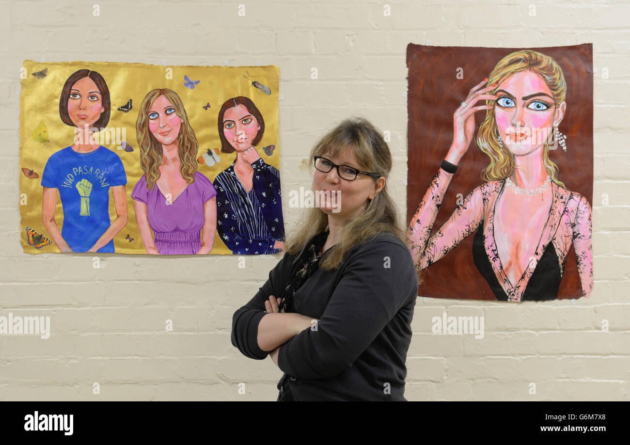 Stella Vine stands between her works, 'Pussy Riot butterfly' (left) and ...