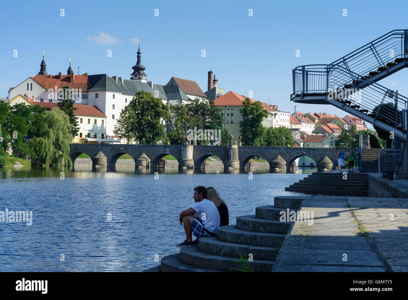 Stone bridge over the Otava River and Old Town, Pisek, Czech Republic ...