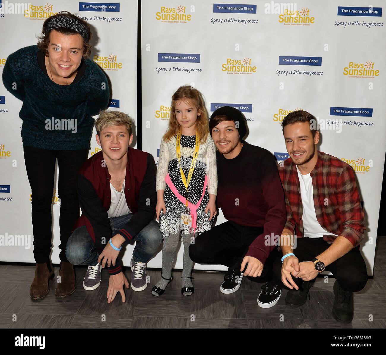 Four members of the boy band One Direction (left to right) Harry Styles ...