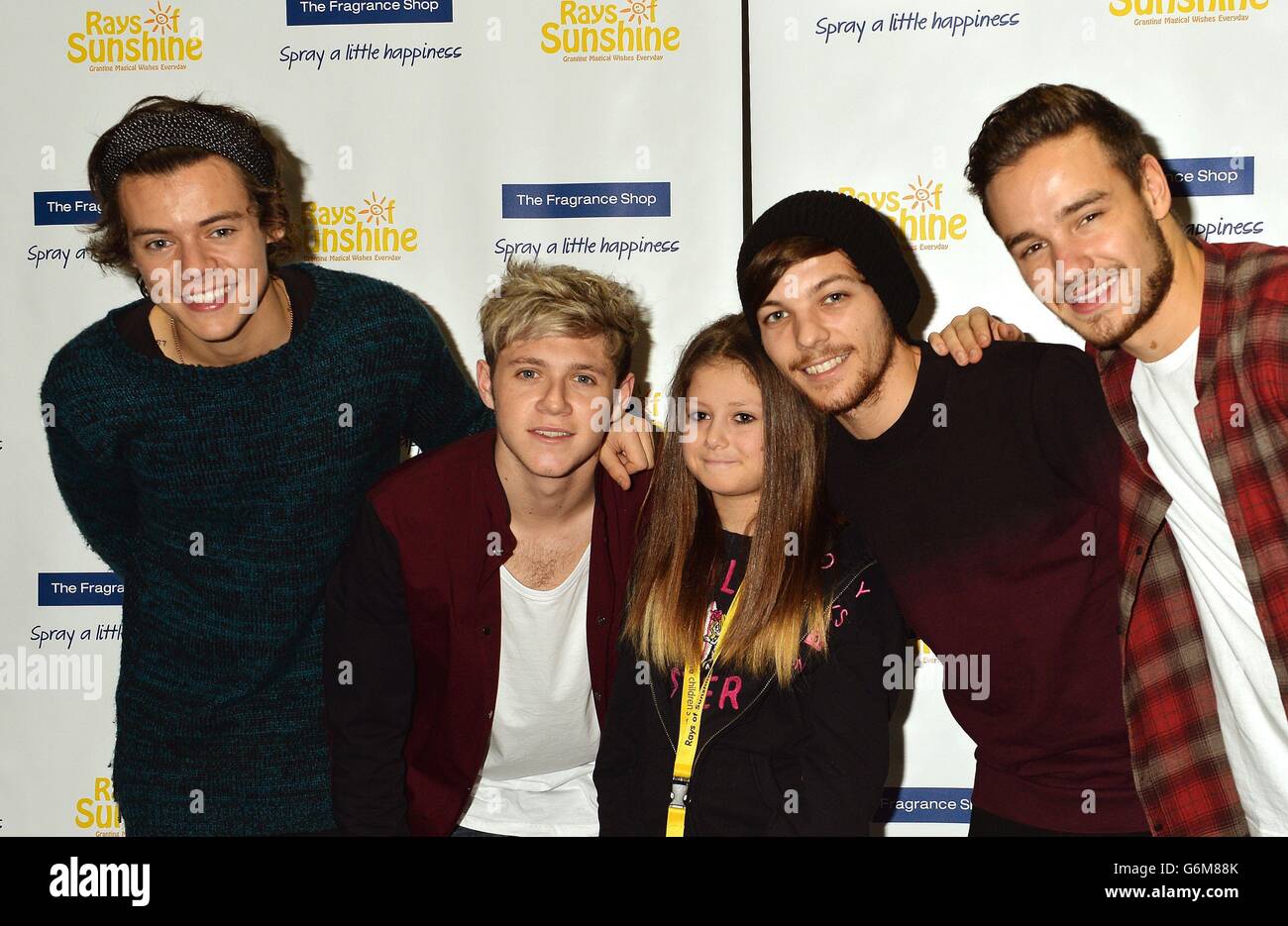 Four members of the boy band One Direction (left to right) Harry Styles ...