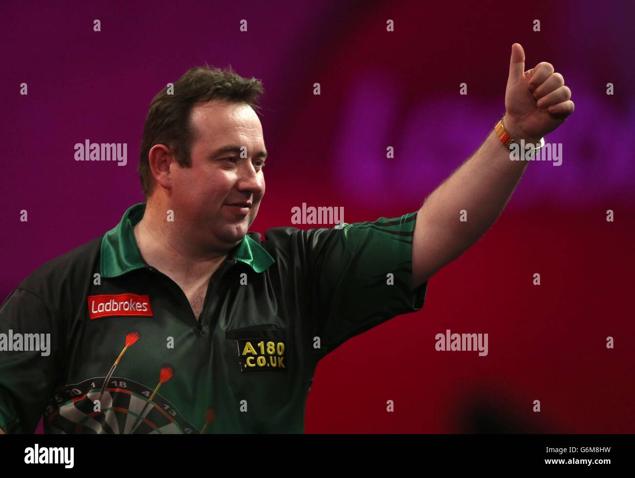 Brendan Dolan celebrates his victory over Colin Osborne during day ...